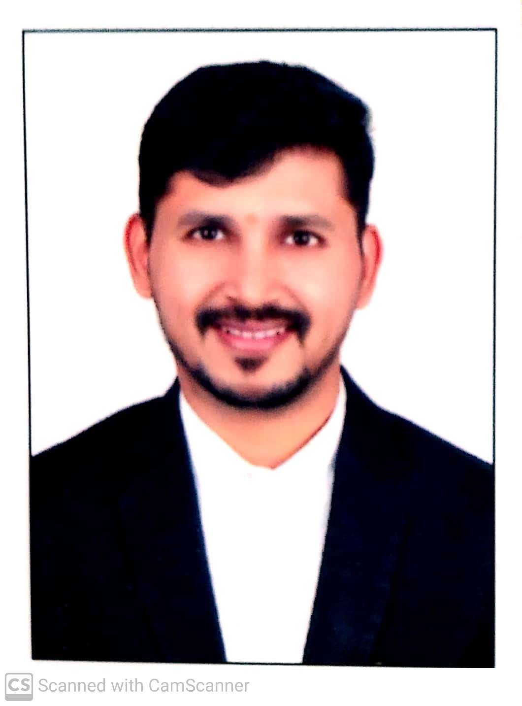 Mr.GANESH GHADIGAONKAR - Guru Nanak Khalsa College